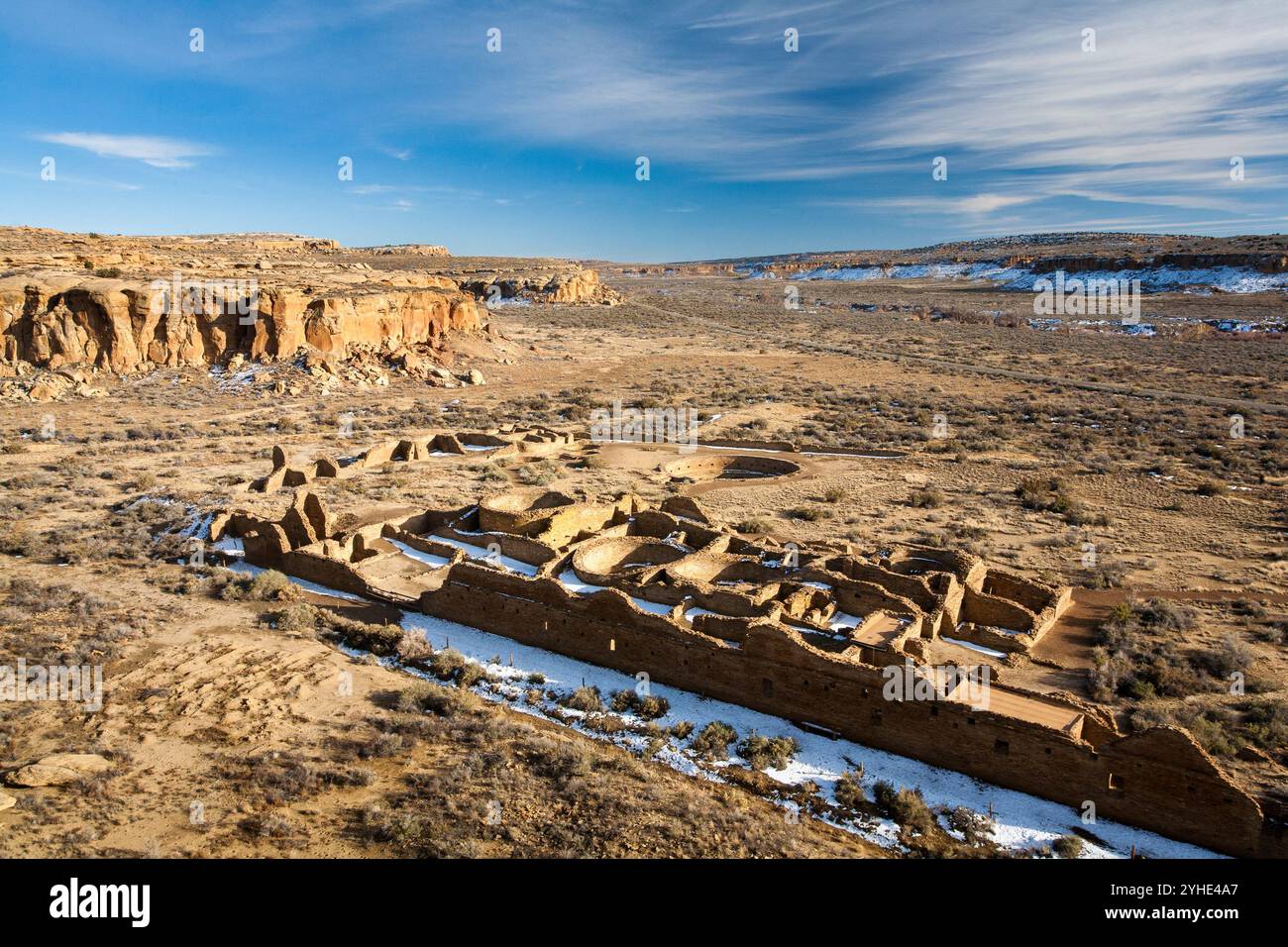 The Chetro Ketl Pueblo ruins sprawled out below the cliffs of Chaco ...