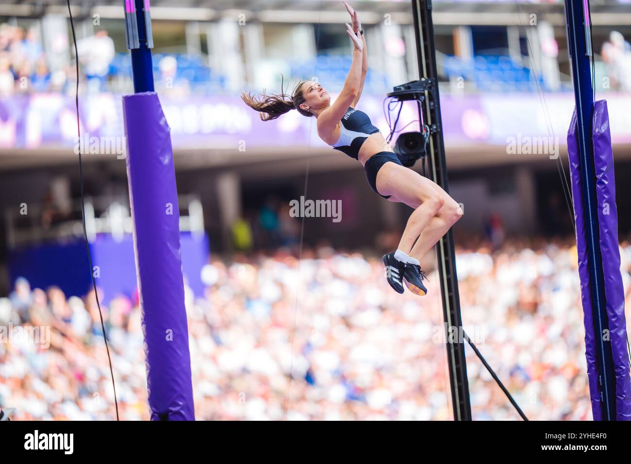 Imogen Ayris participating in the pole vault at the Paris 2024 Olympic ...