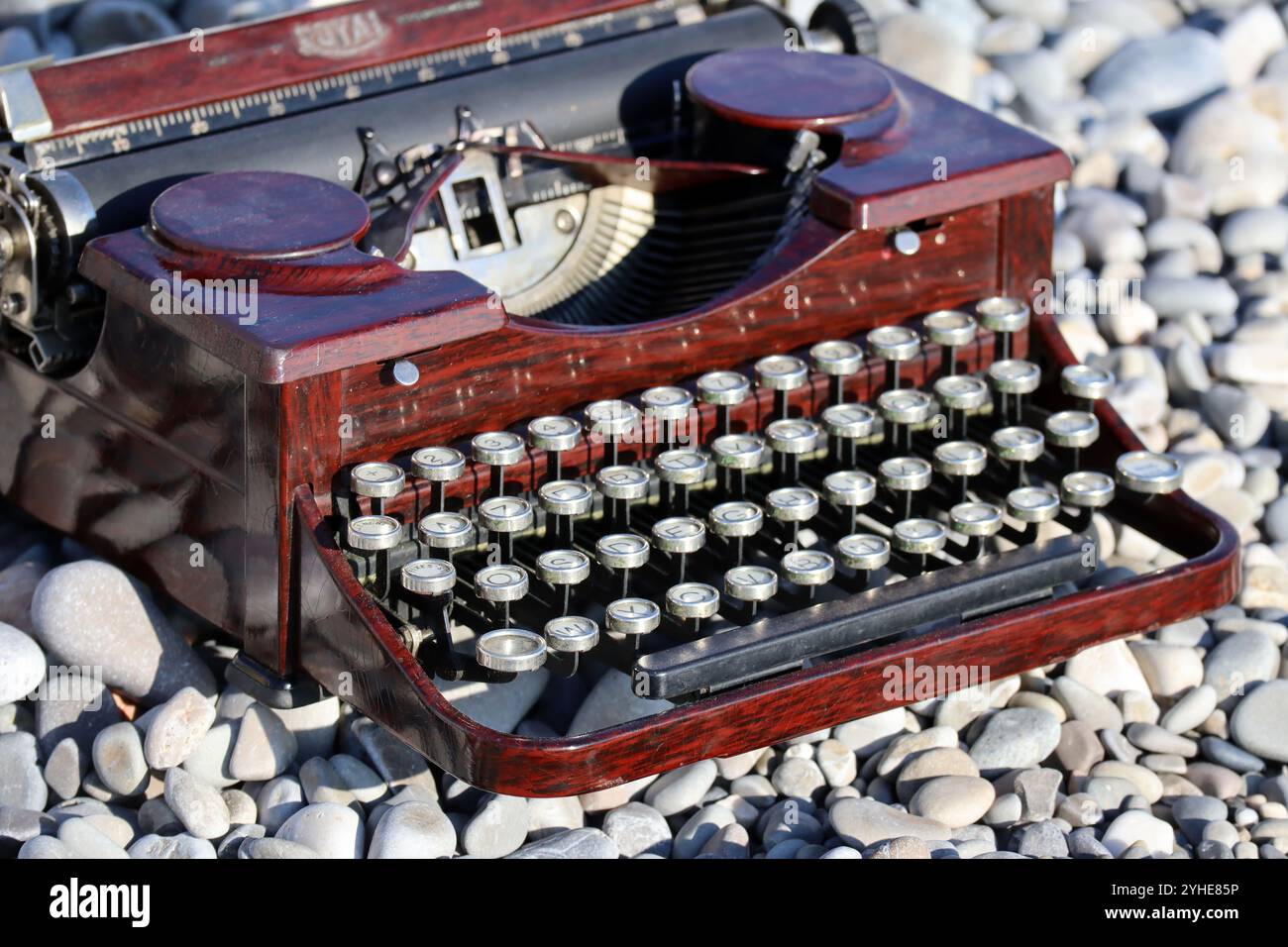 Retro Royal typewriter on a pebble beach on the French Riviera Stock ...
