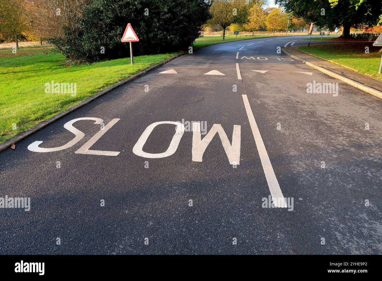 Speed humps and slow sign on the access road to Heythrop Park hotel and ...