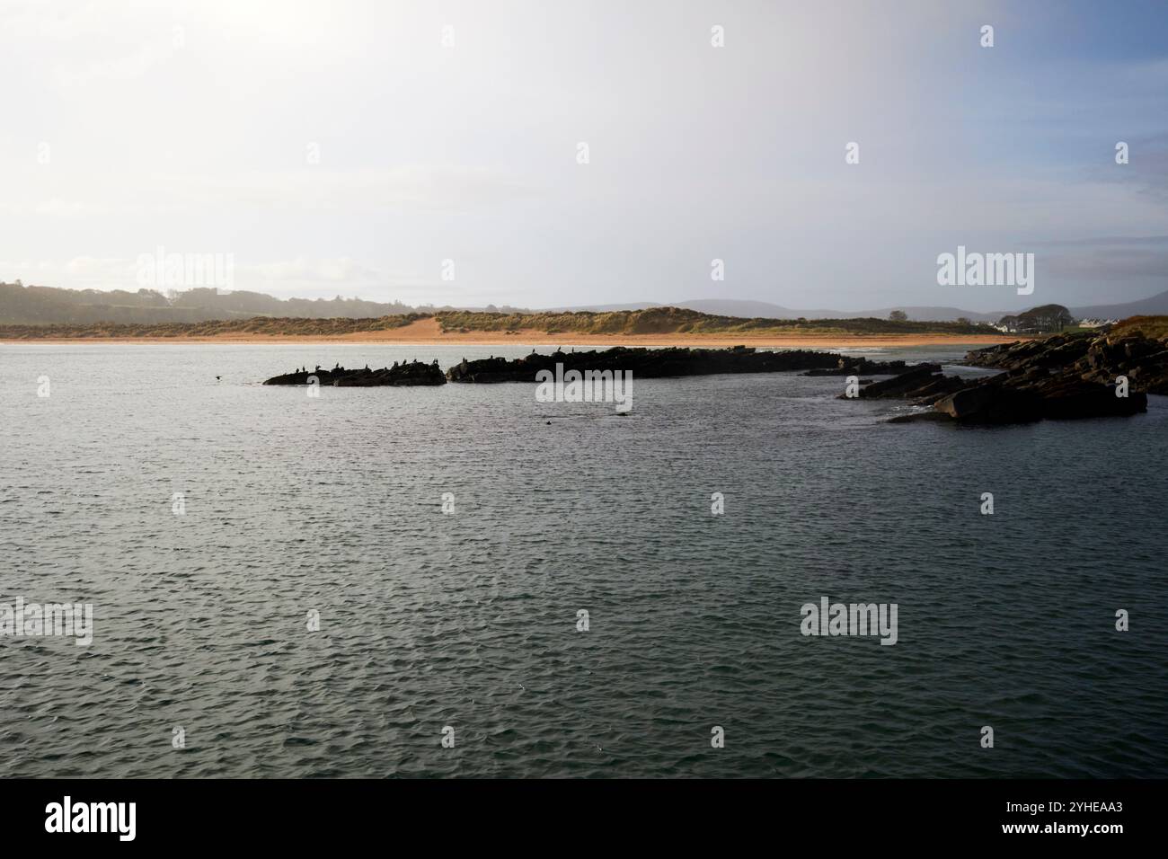 culdaff beach viewed from bunagee pier and rocks, county donegal ...