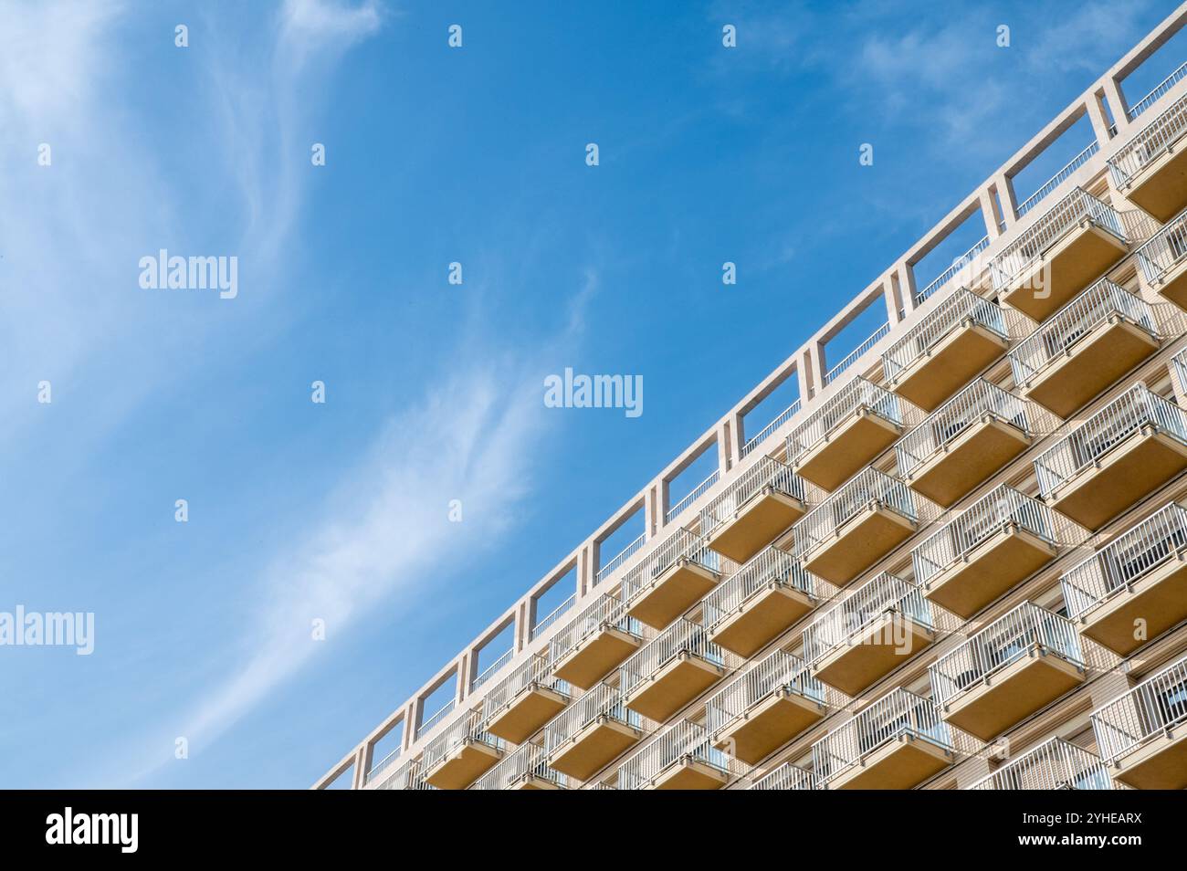 A striking view of a vibrant building at an angle, showcasing the ...