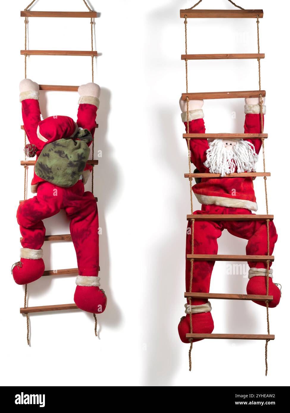 Christmas decorations with Santa Claus puppet climbing wooden stairs ...