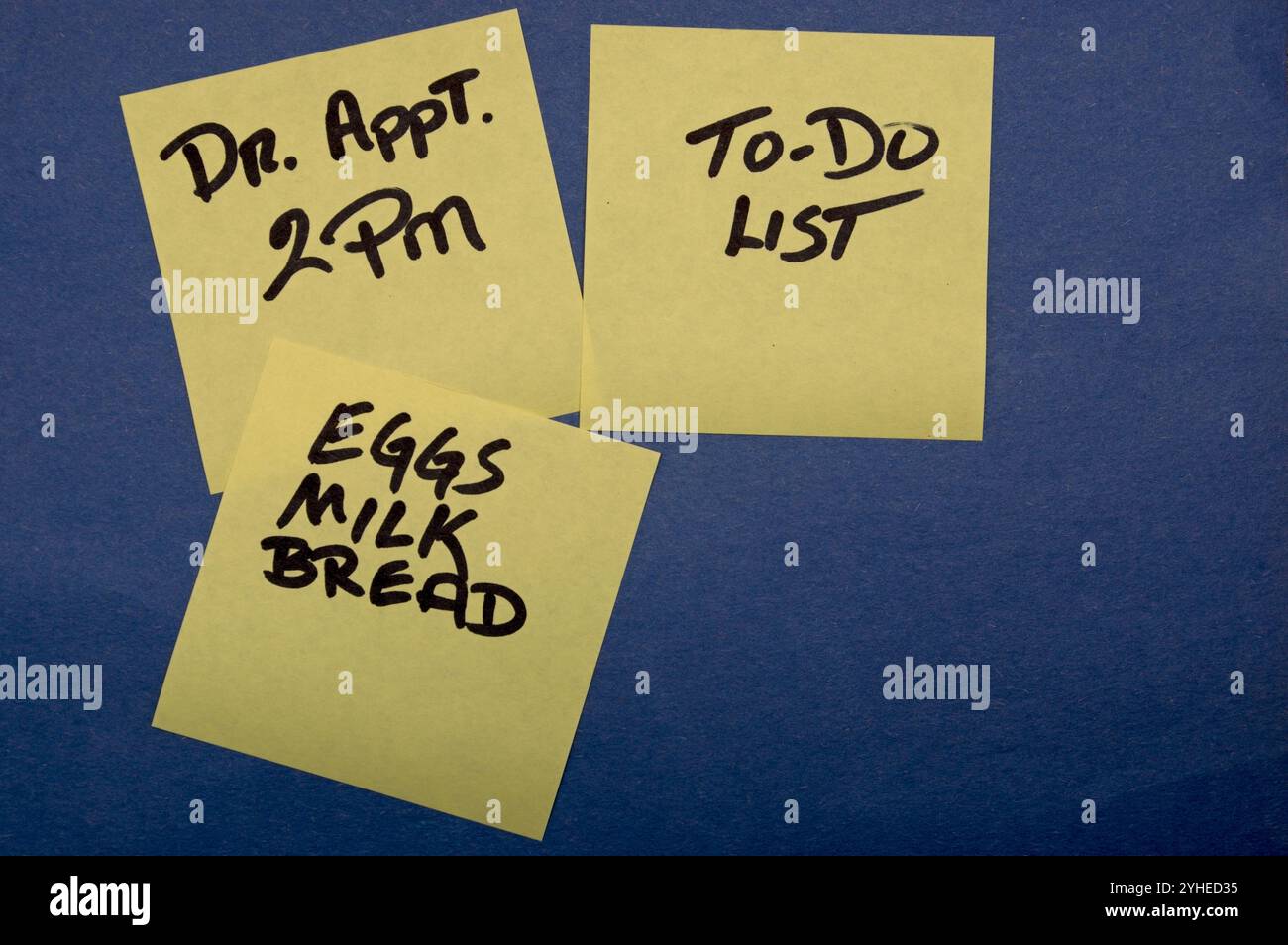 Reminders for Doctor appointment and grocery items on a sticky note ...