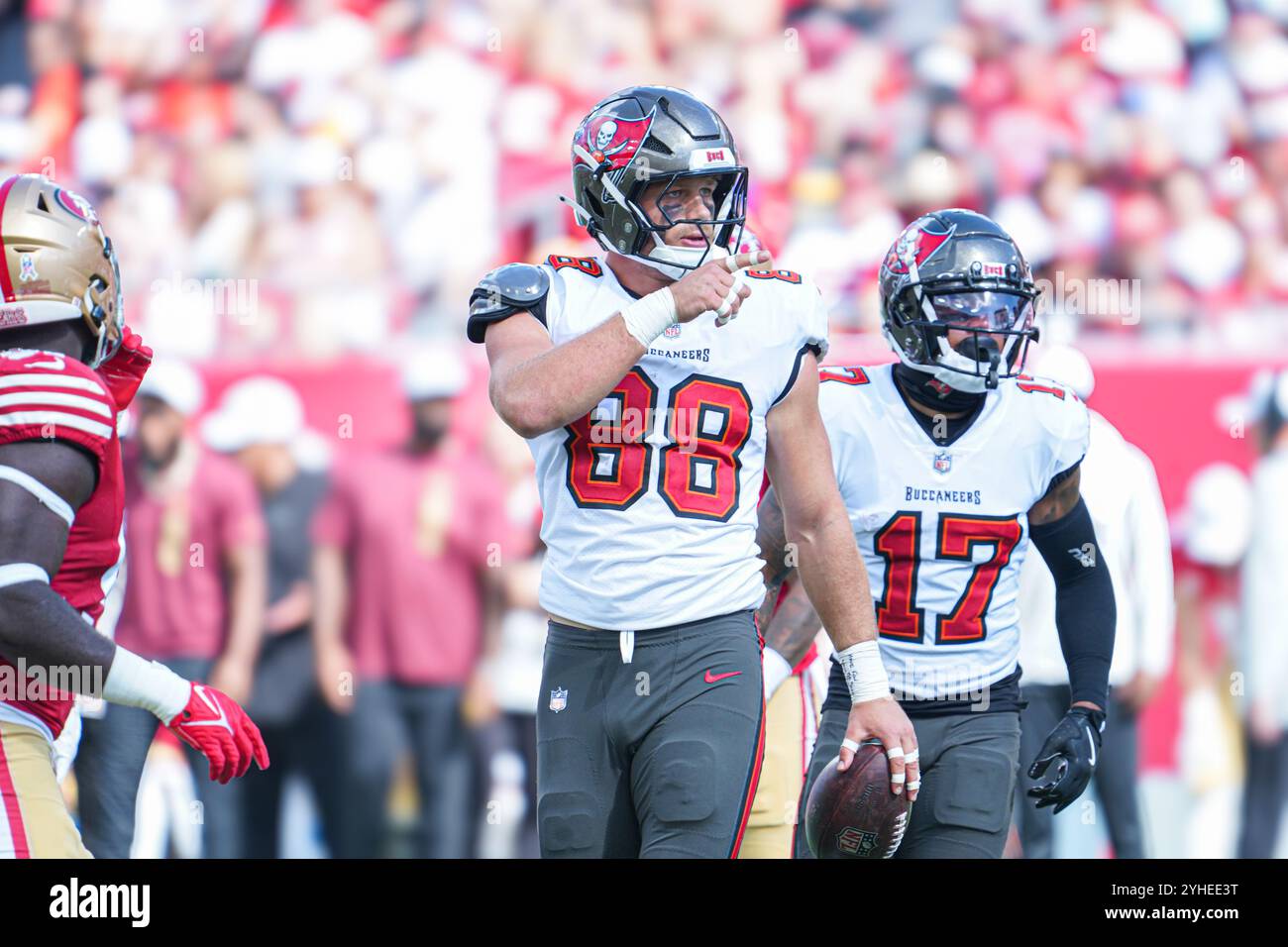 Tampa Bay, Florida, USA, November 10, 2024, Tampa Bay Buccaneers tight end Cade Otton #88 points ...