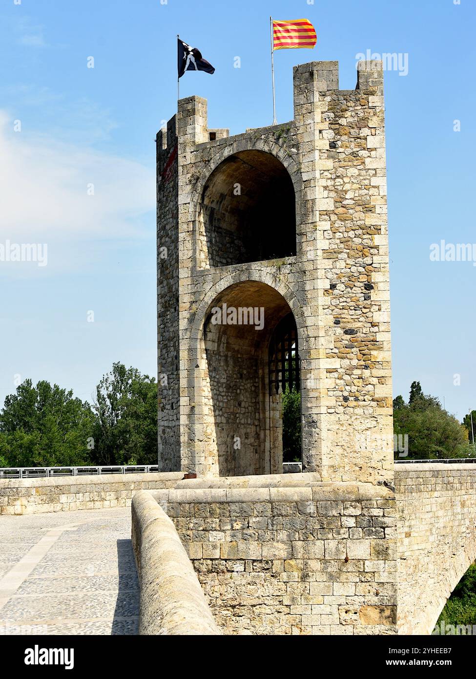 The fortified bridge leading to the medieval village of Besalù in ...