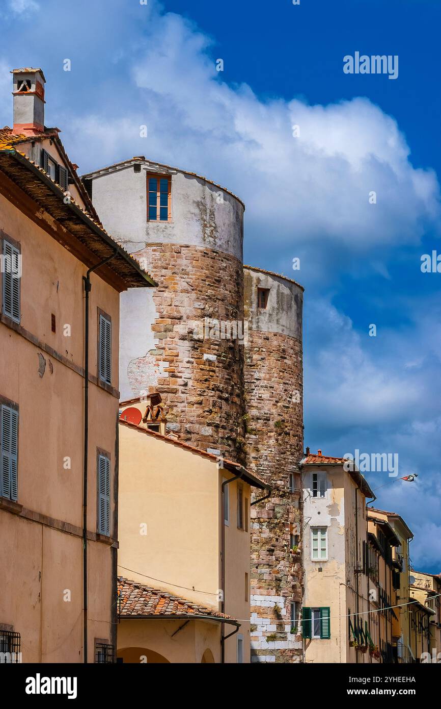 Lucca beautiful medieval historical center with St Gervasius Gate twin towers Stock Photo - Alamy
