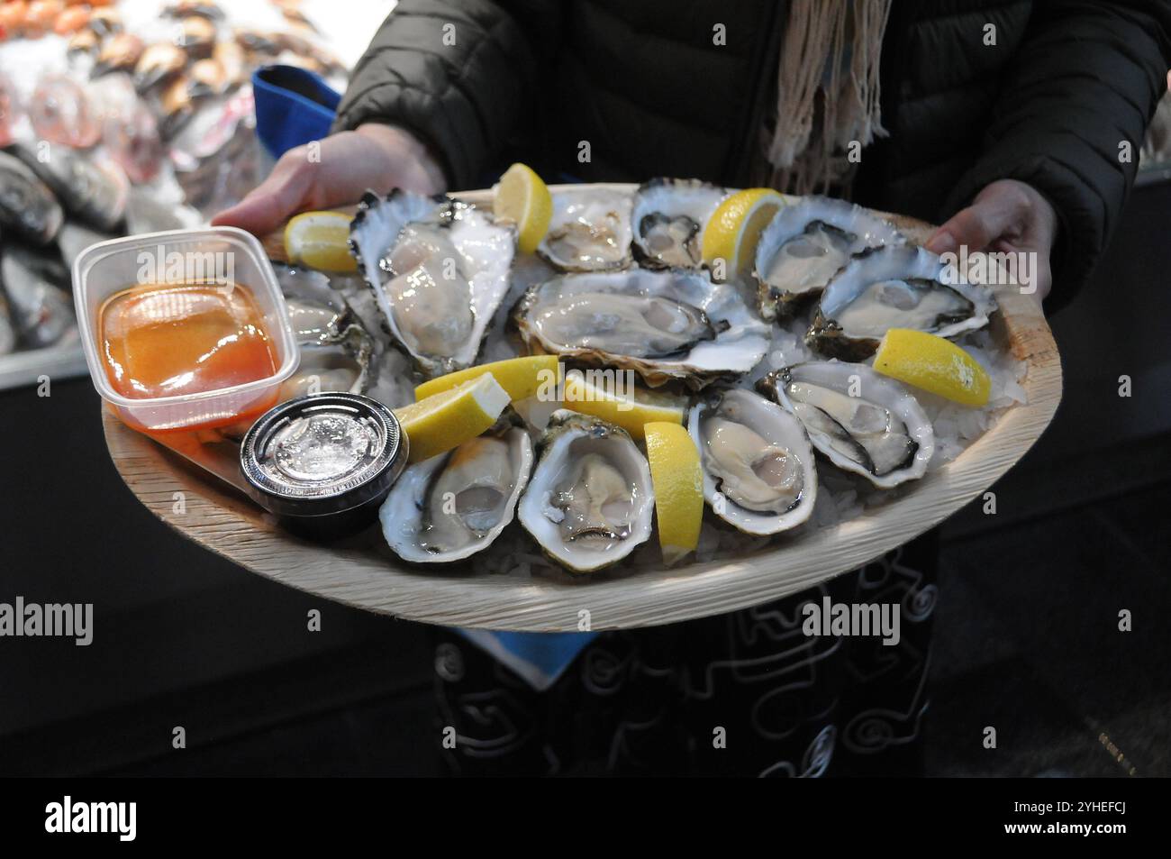 Copenhagen/ DenmarK/12 November 2024/ Female holding Oyster menu plate ...