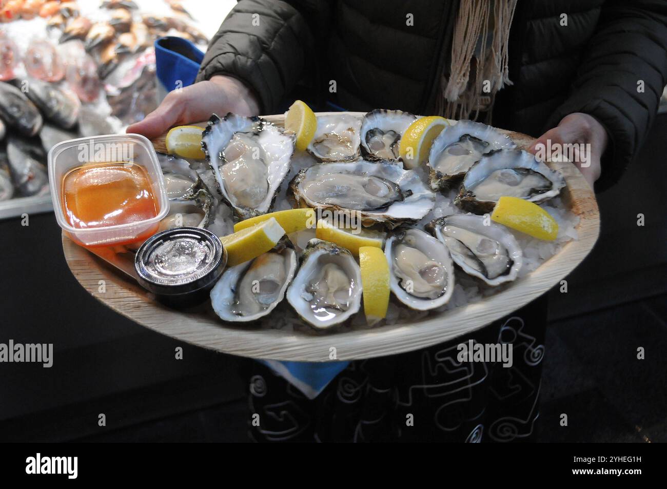Copenhagen/ DenmarK/12 November 2024/ Female holding Oyster menu plate ...