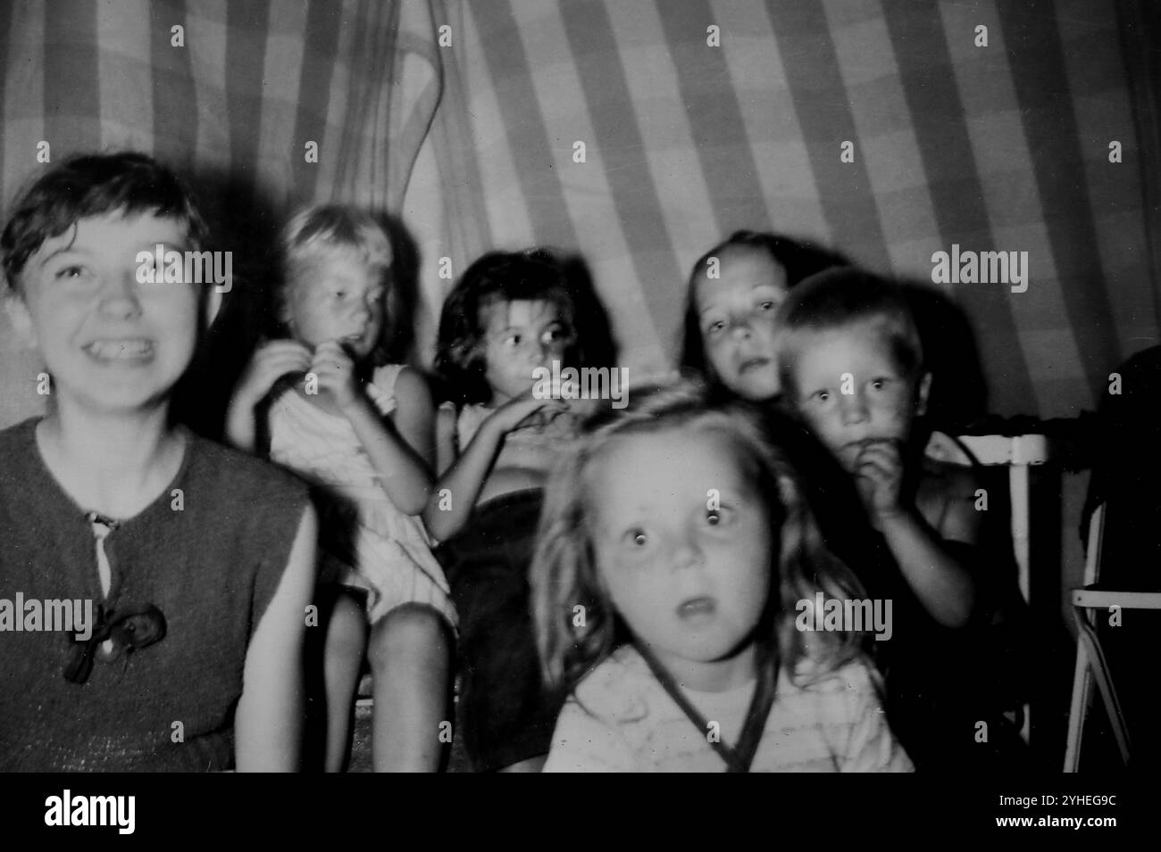 Neighborhood kids get together in a tent, ca. 1958 Stock Photo - Alamy