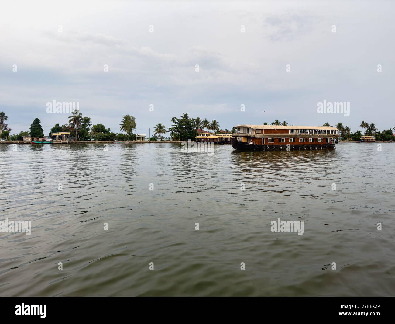 Alleppey, Kerala, India - May 15 2024: Experience of a scenic houseboat cruise through the ...