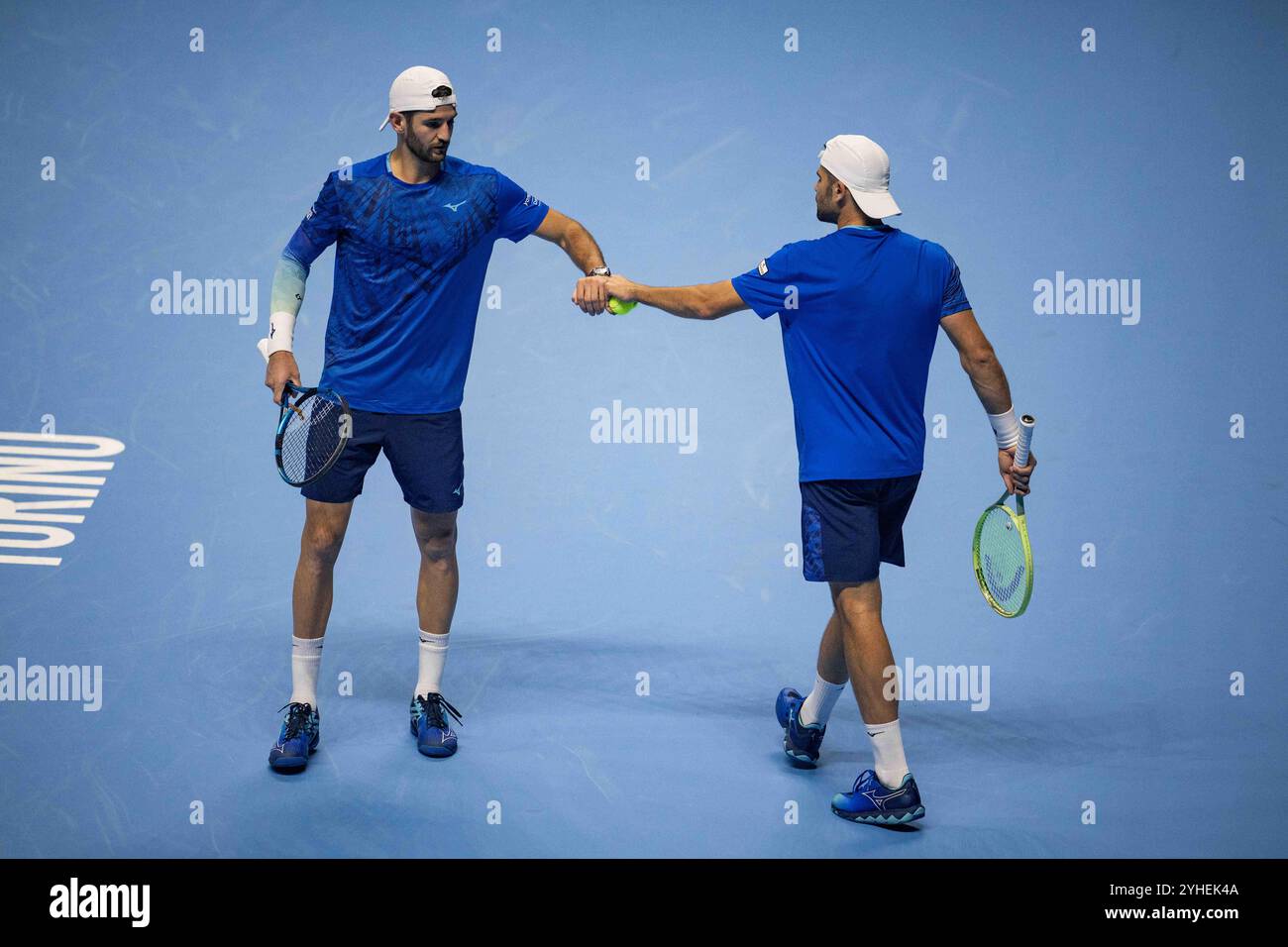 Torino, Italia. 11th Nov, 2024. Italy's Andrea Vavassori and Italy's Simone Bolelli react during ...