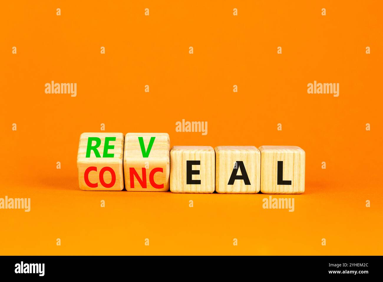 Reveal or conceal symbol. Turned wooden cubes and changed word Conceal ...