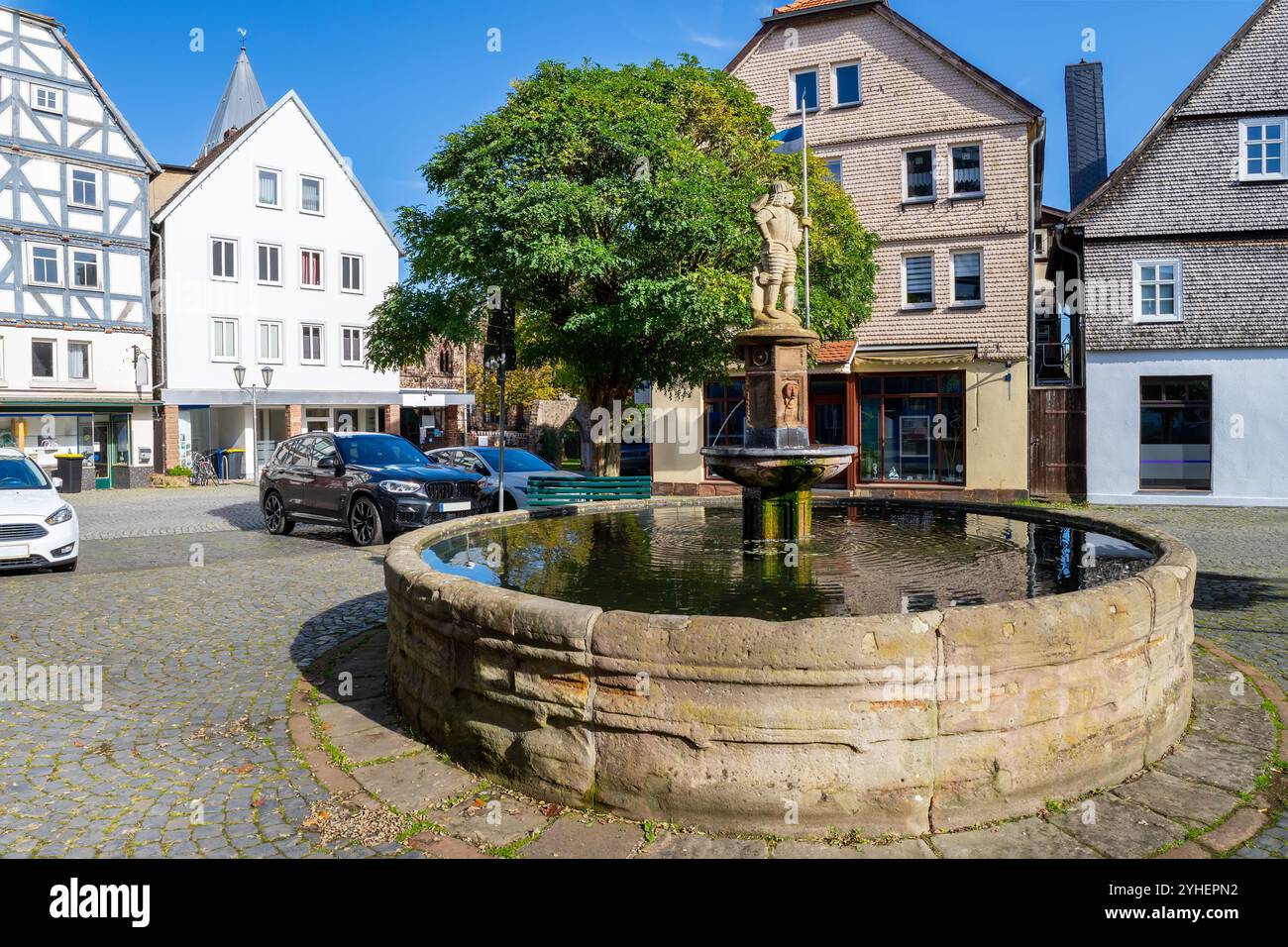 Market fountain with Johannismännchen in the city of Schwalmstadt ...