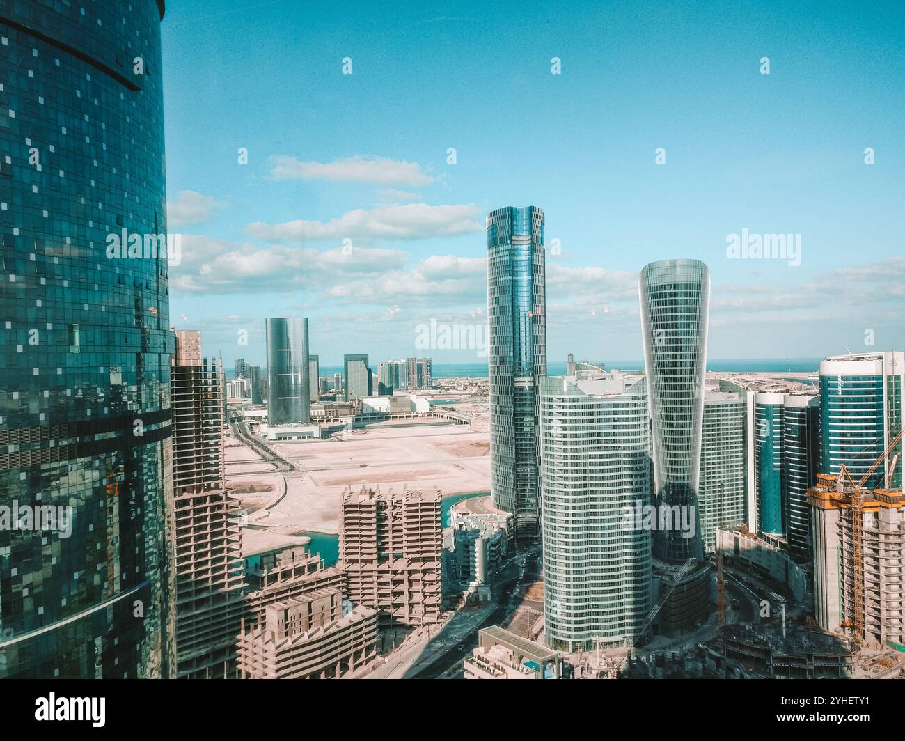 Top aerial view shot of city skyscrapers from a modern office space ...