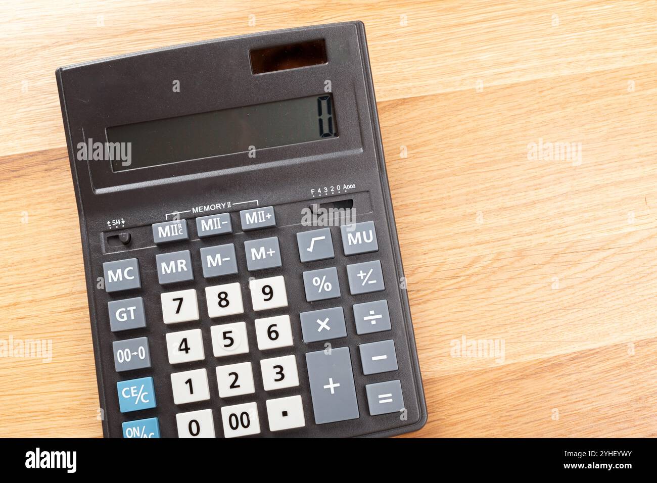 calculator on desk Stock Photo - Alamy