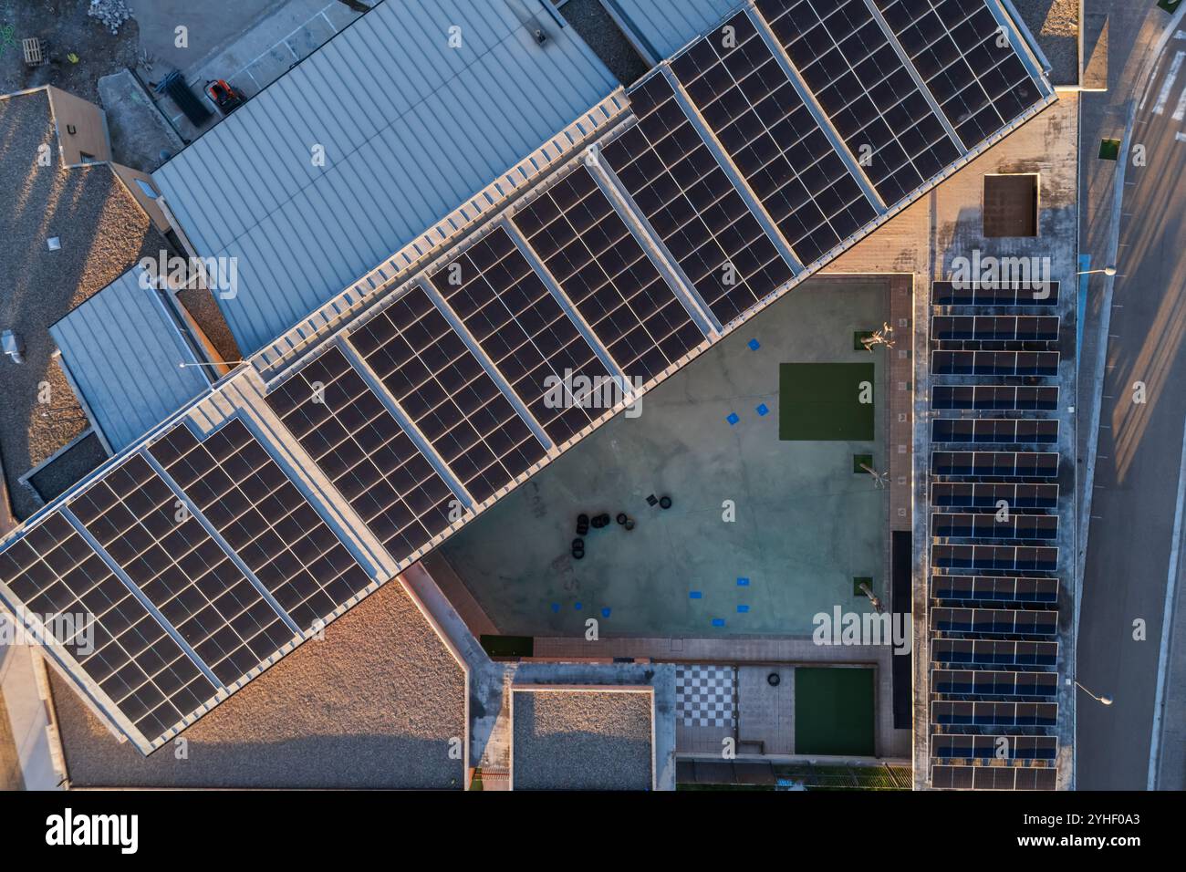Aerial view of solar panels on roof building Stock Photo - Alamy