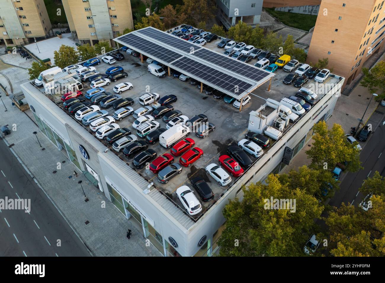 Aerial view of parked vehicles on the rooftop of a Volkswagen car ...