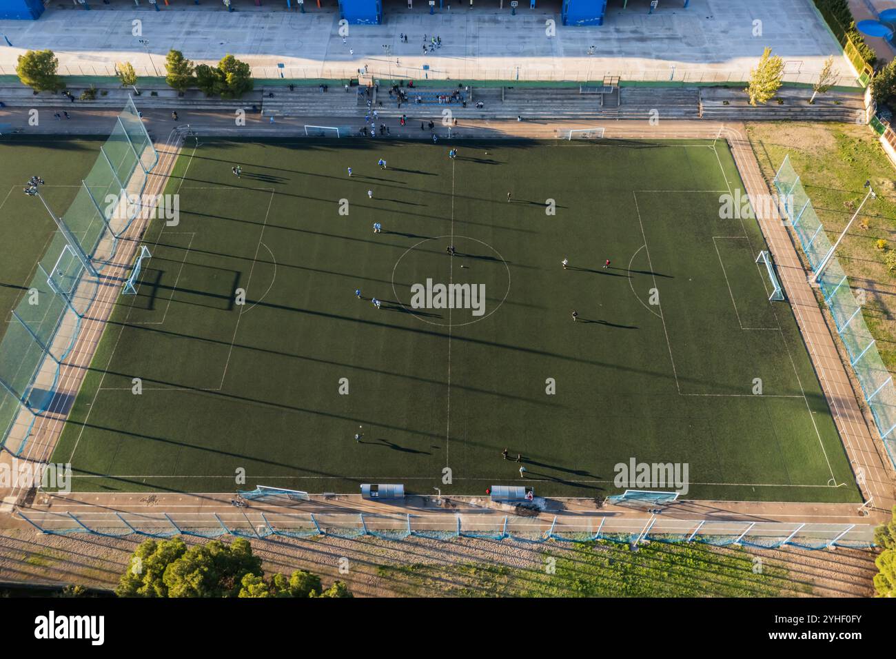 Aerial view of amateur soccer match at sunset Stock Photo - Alamy
