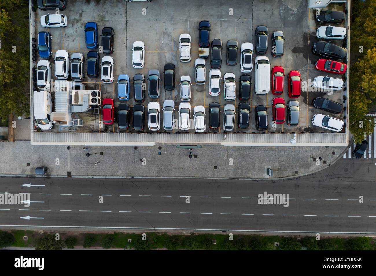 Aerial view of parked vehicles on the rooftop of a Volkswagen car ...