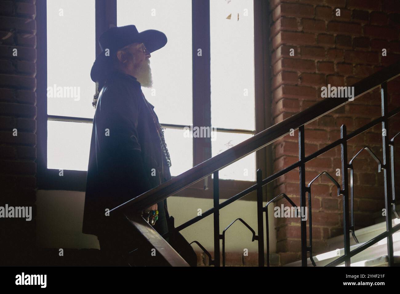 Person walking up stairs in a vintage Interior from bulgur palace in ...