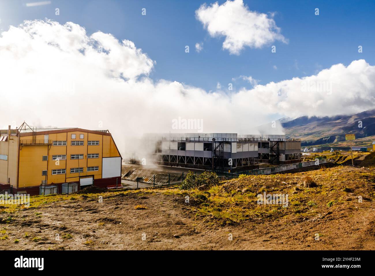 Geothermal power station in a mountain valley. View of the buildings ...