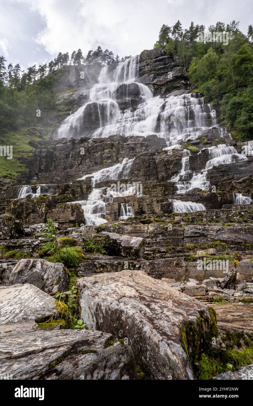 Tvindefossen waterfall in Voss, Norway, cascades down rugged rocks ...
