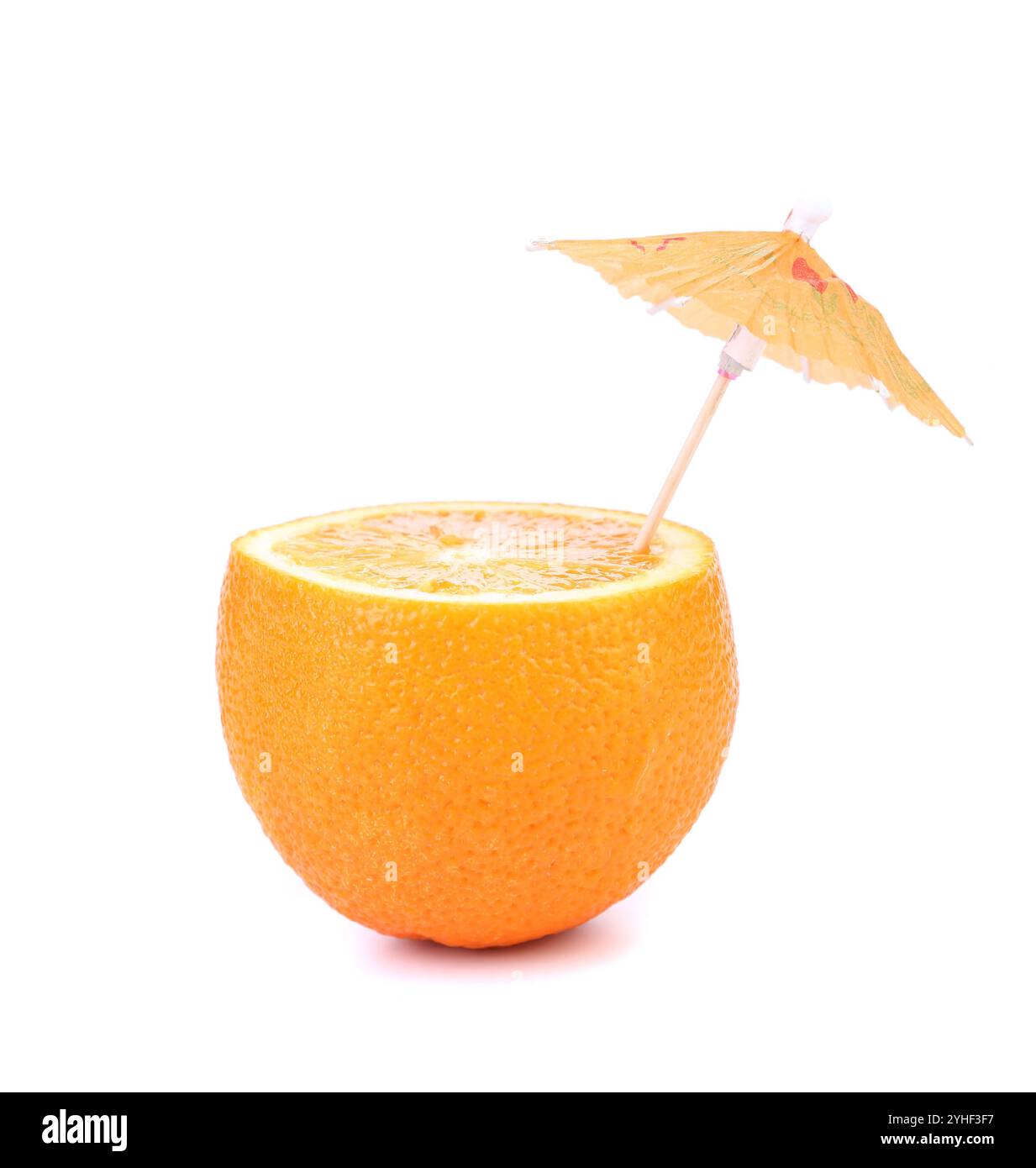 Cut orange under umbrella isolated on white background Stock Photo - Alamy