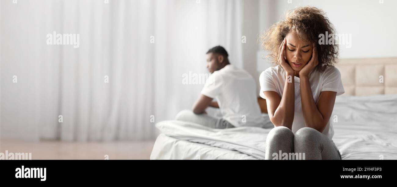 Strained relationship between a couple in a dimly lit bedroom setting ...