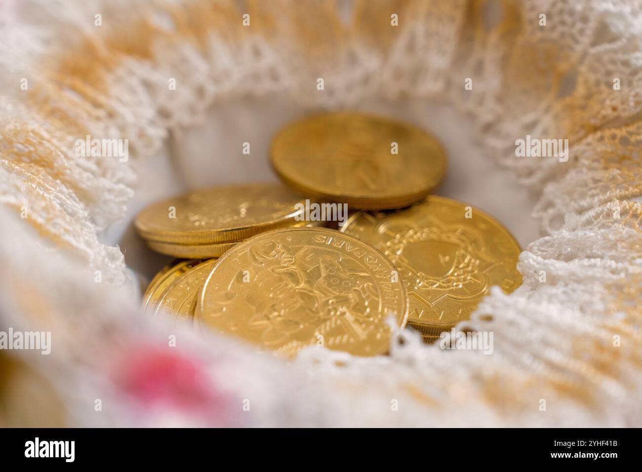 arras gold coins in basket Stock Photo - Alamy