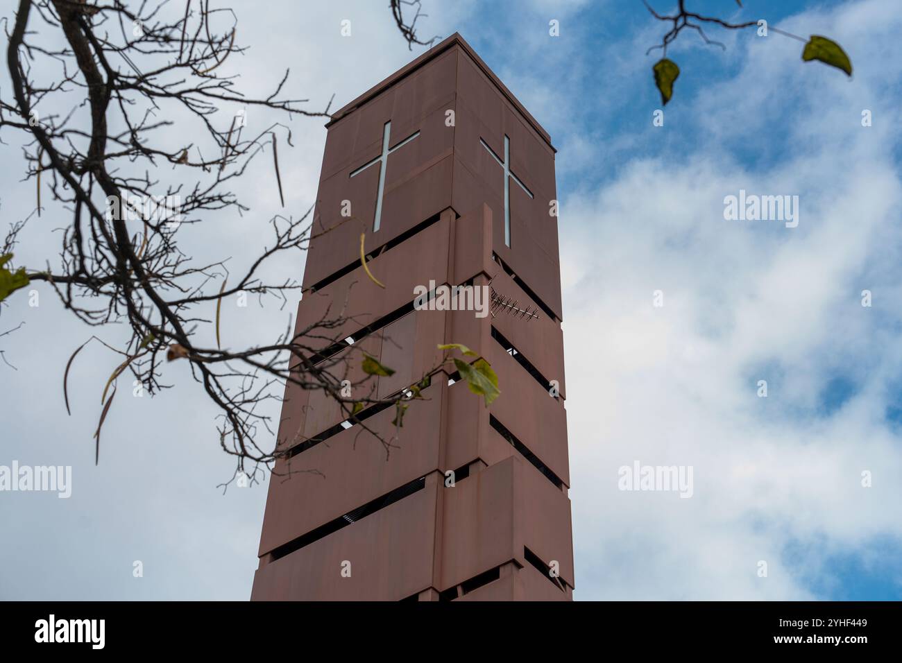 rusty brown church tower with cross on top Stock Photo - Alamy