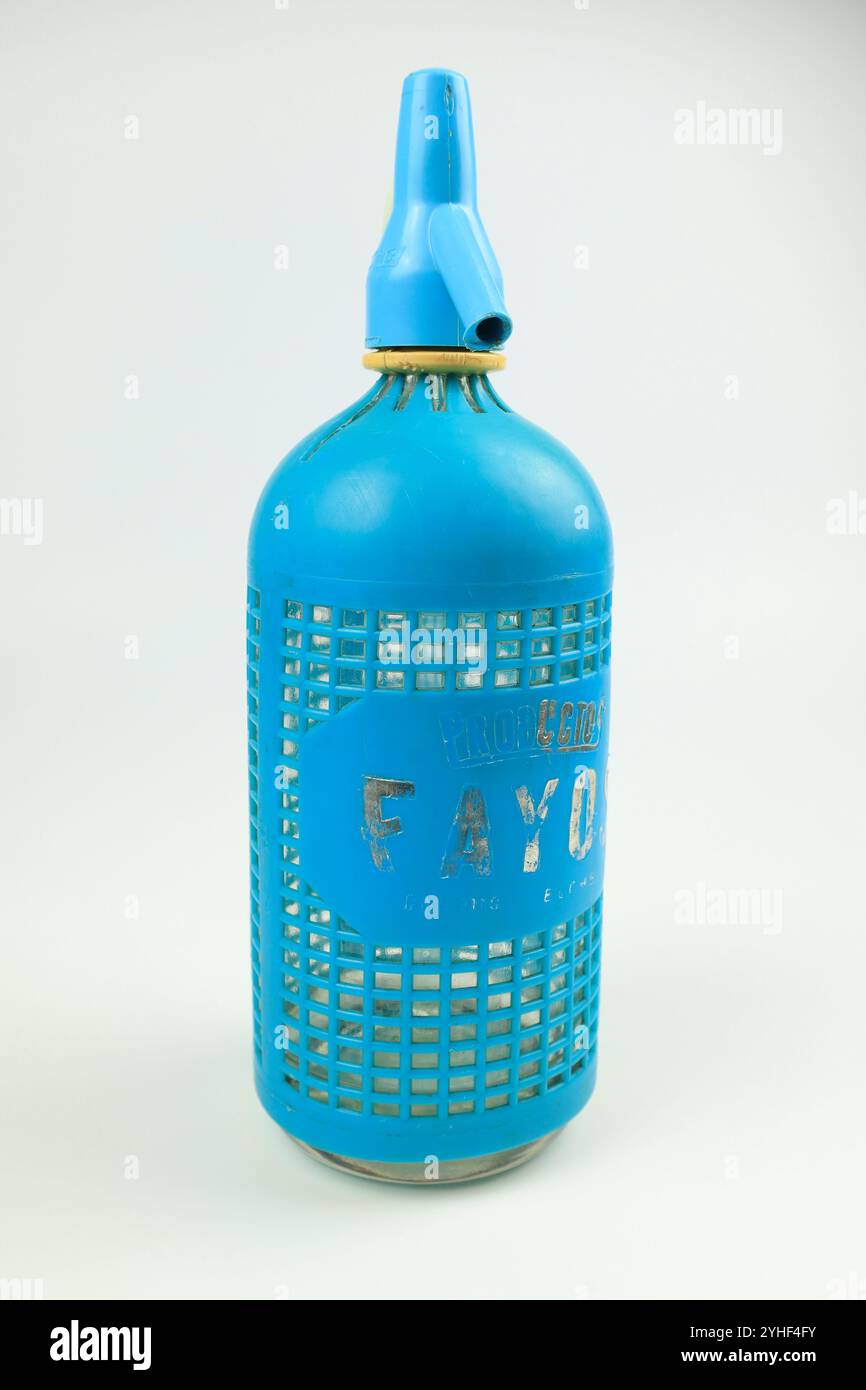 Madrid, Spain- November 14, 2024: Vintage blue soda bottle on white ...