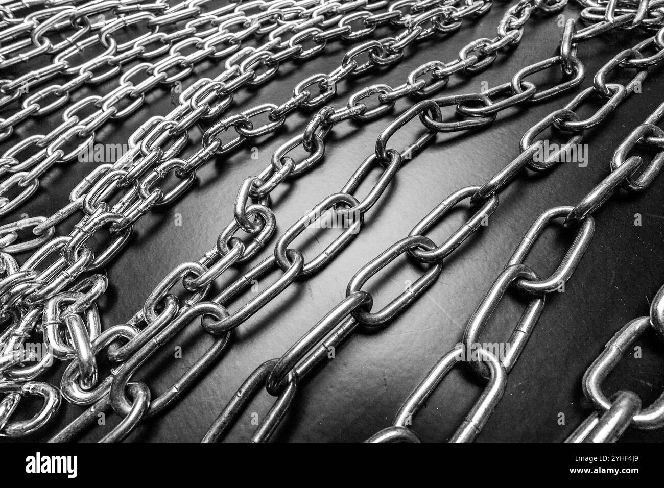 Hanging chains Black and White Stock Photos & Images - Alamy