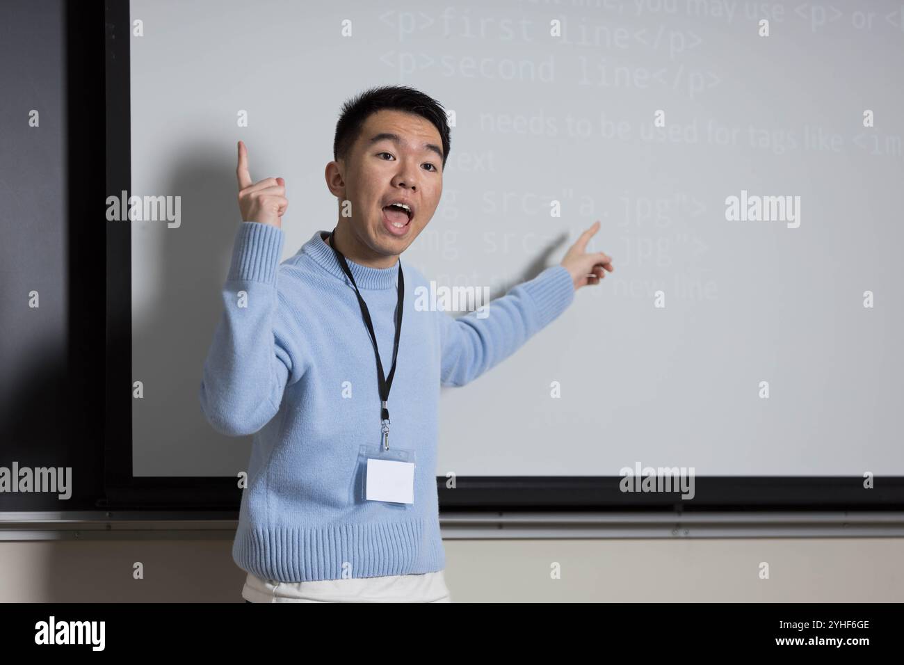 A young university student giving a confident presentation speech in ...