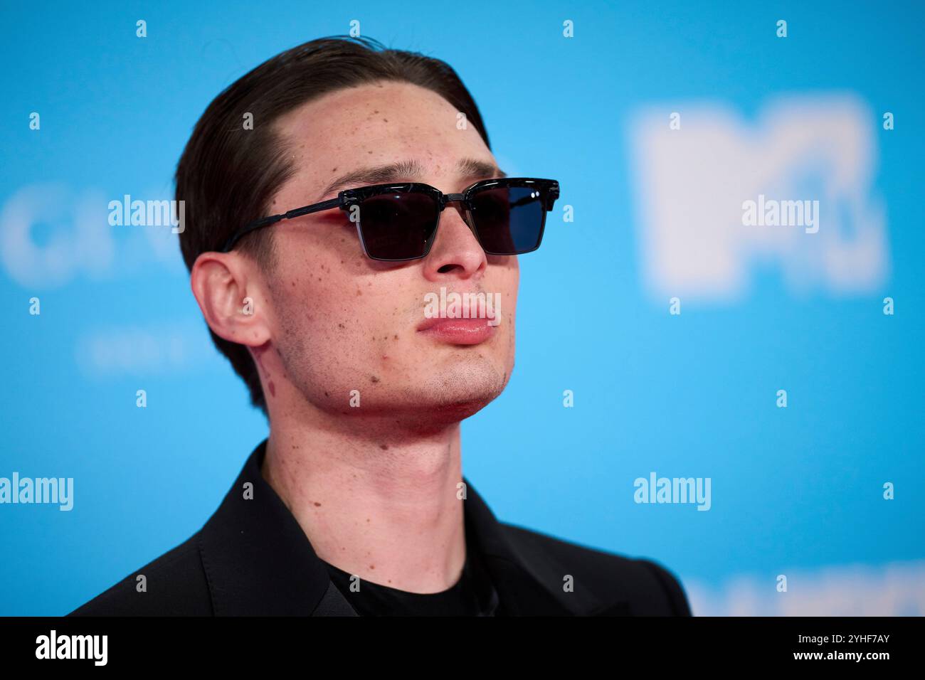 Peso Pluma poses for photographers upon arrival at the MTV European ...