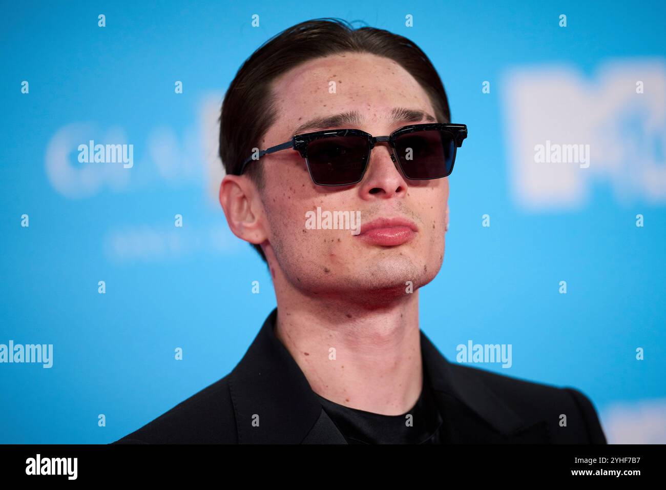 Peso Pluma poses for photographers upon arrival at the MTV European ...