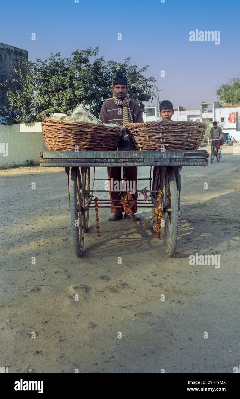 07MAY2008, Agra, India - Traditional Indian street seller and helper ...