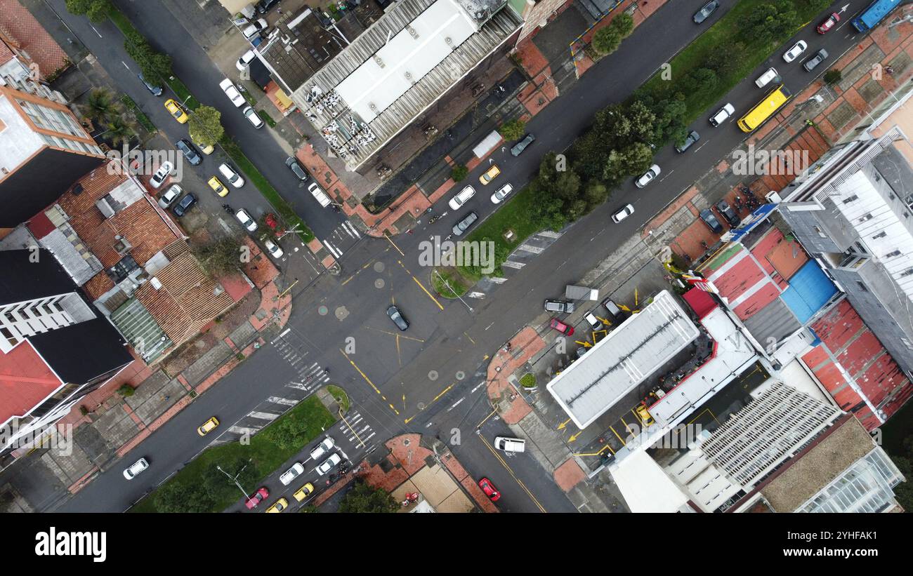Aerial view of an urban intersection with streets and traffic flows in ...