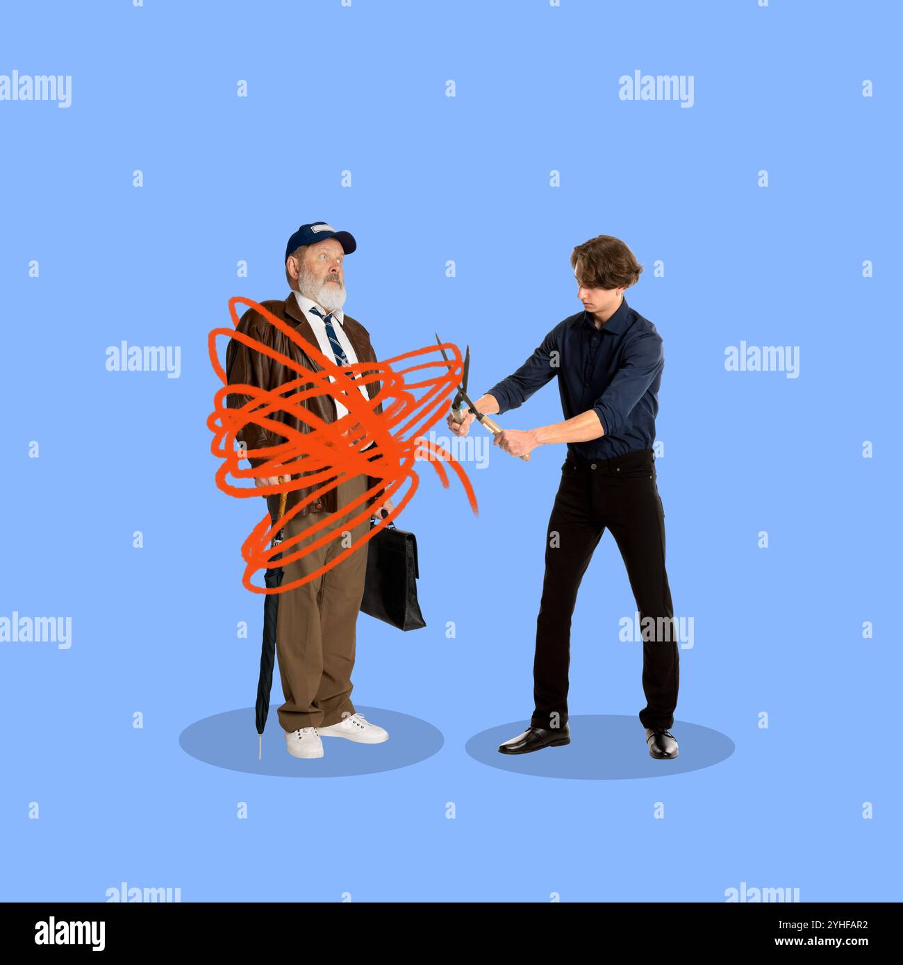 Young man using scissors to cut through tangled mess around elderly man ...