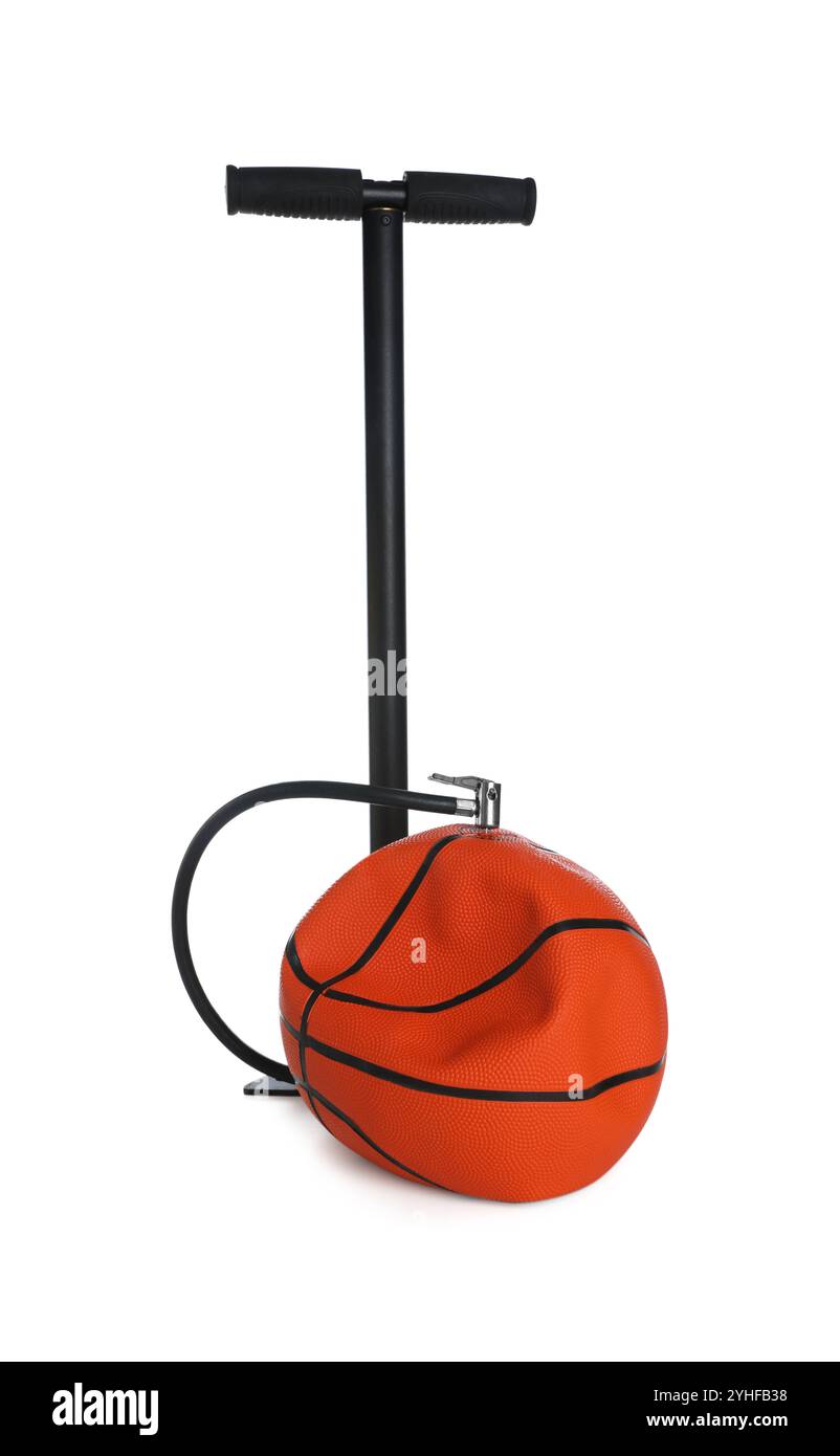 Deflated basketball ball and manual air pump isolated on white Stock ...
