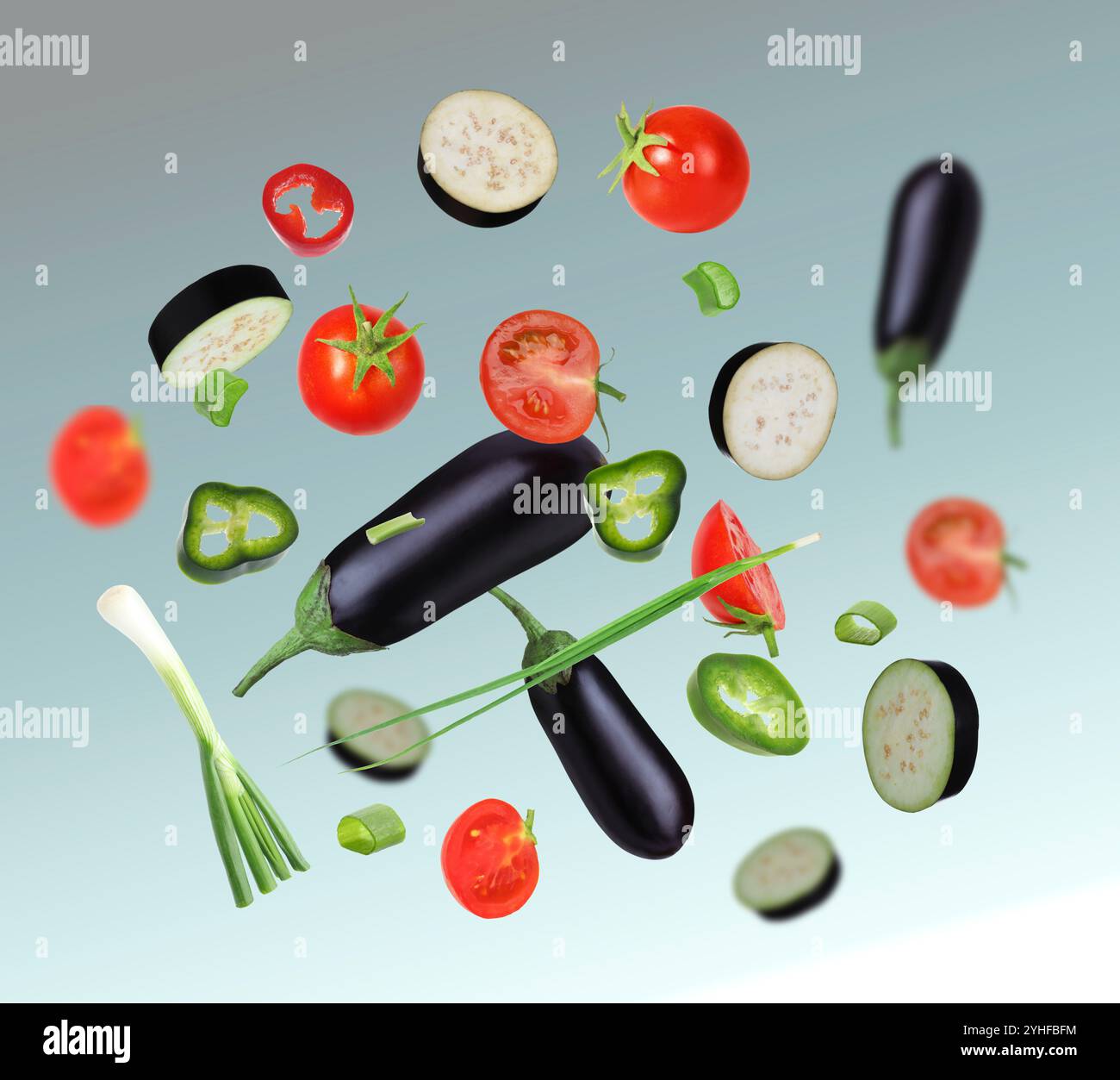 Many different fresh vegetables in air on grey gradient background ...