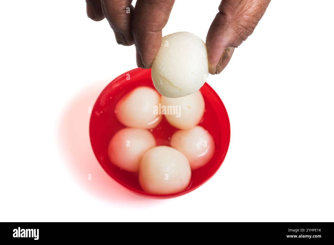 Hand picking rasgulla hi-res stock photography and images - Alamy