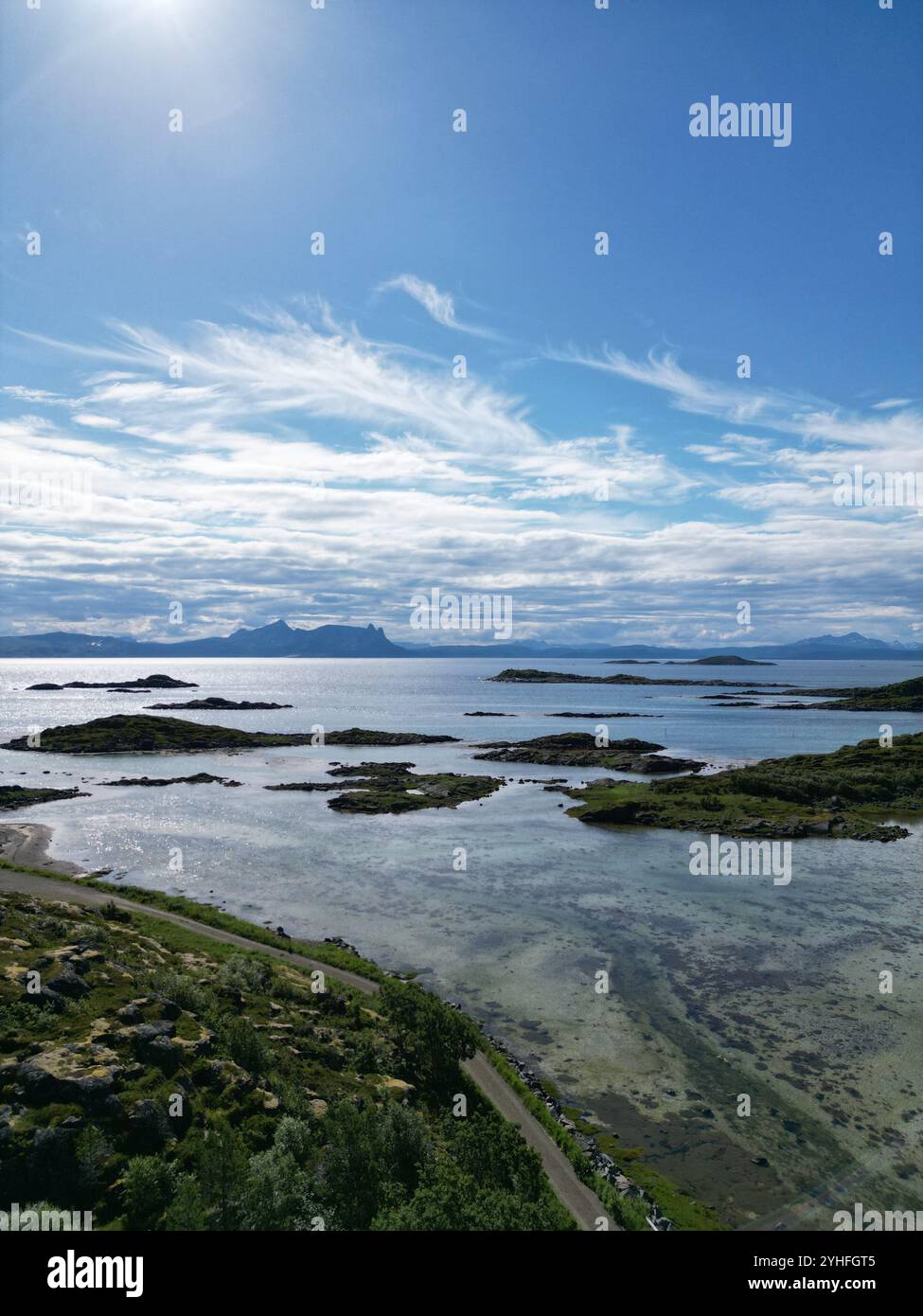 Vertical Drone Shot, Half sea ocean, green rocky islands, beach, half ...