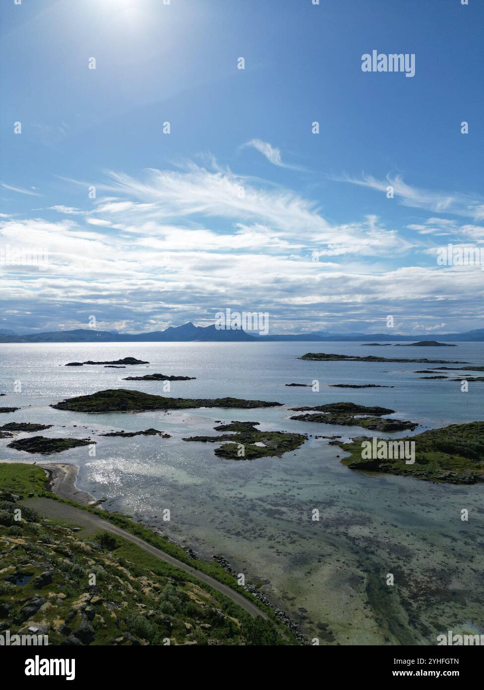 Vertical Drone Shot, Half sea ocean, green rocky islands, beach, half ...