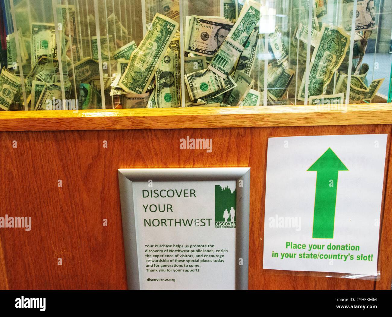 A collection box collecting money at the Cold Water Lake visitor center ...
