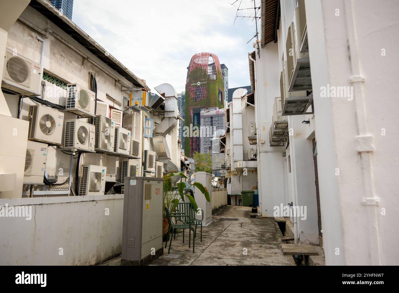 A contrast of a wall of Air conditioning condenser units and in the ...