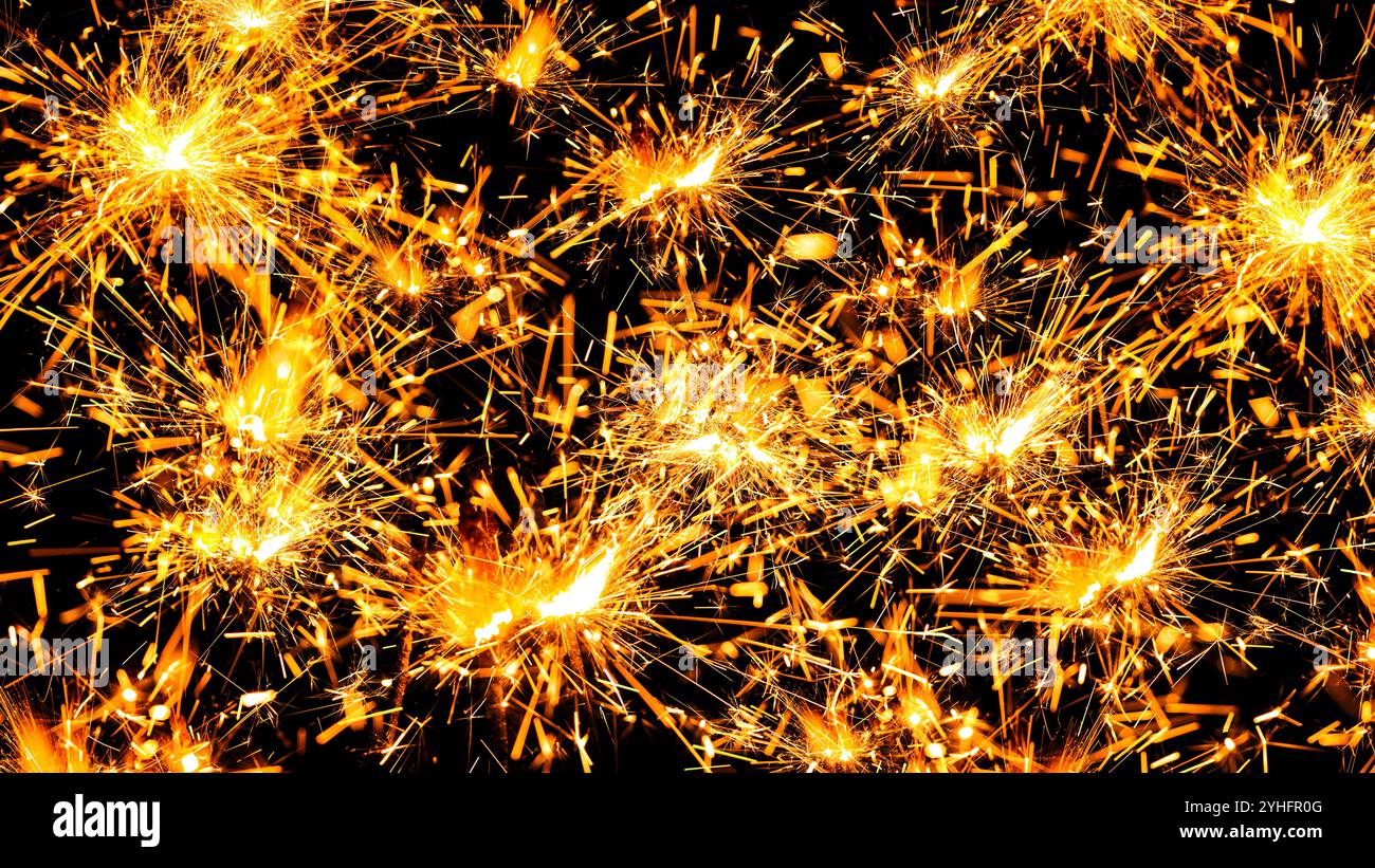 Christmas sparkles on black background. Bengal fire sparkle background ...