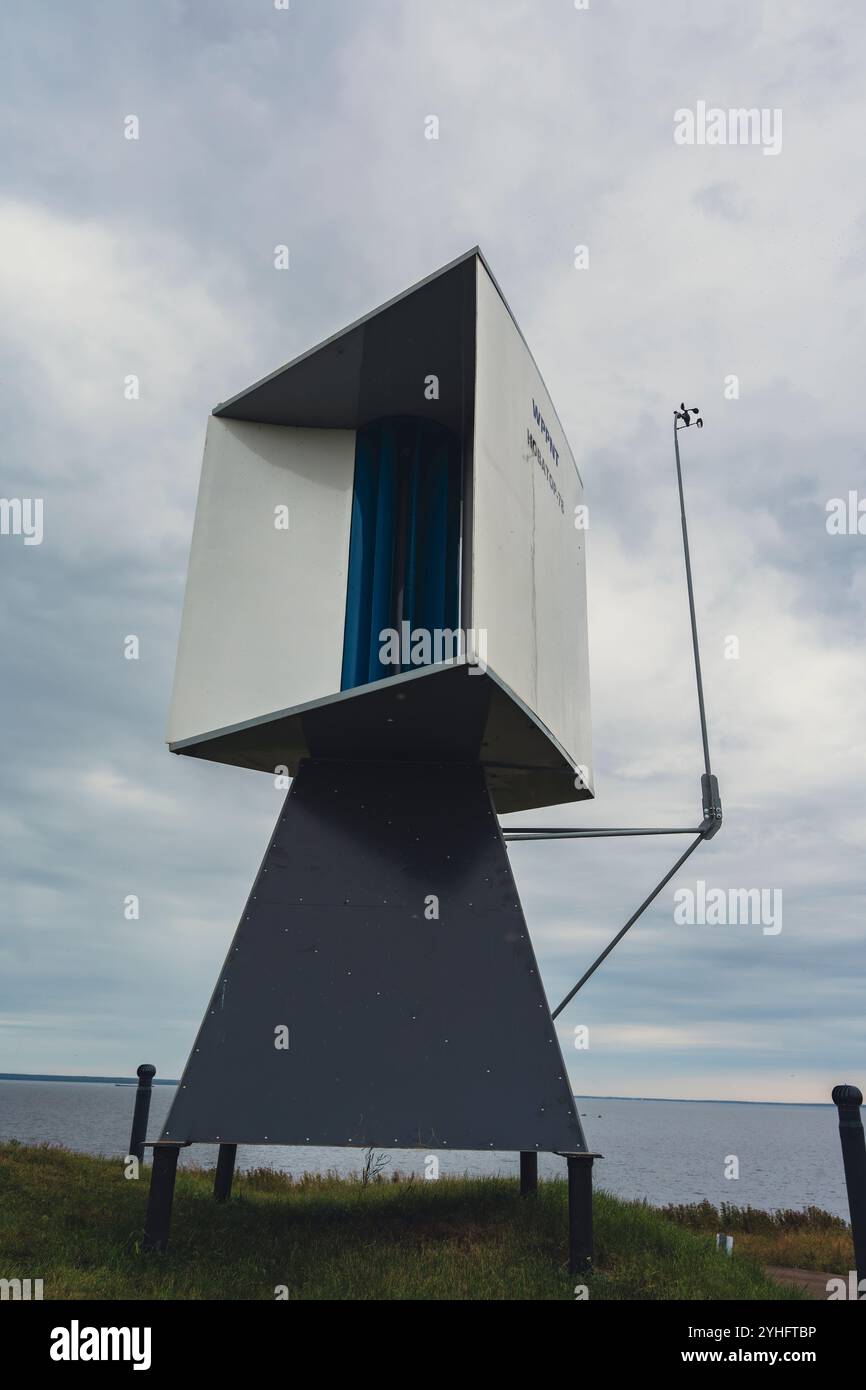 A modern coastal lookout tower with a minimalist, geometric design ...