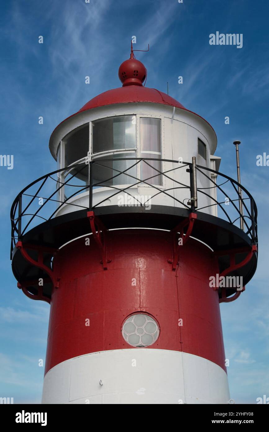 Beautiful lighthouse on the Dutch North Sea coast on a sunny morning ...