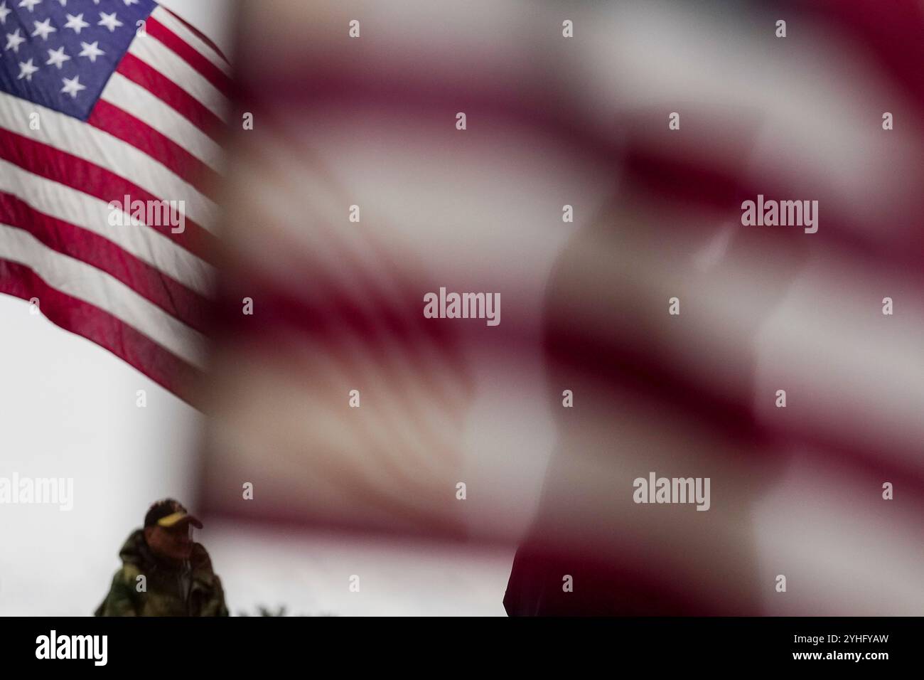 A member of the Washington State Guard stands during the Pledge of ...